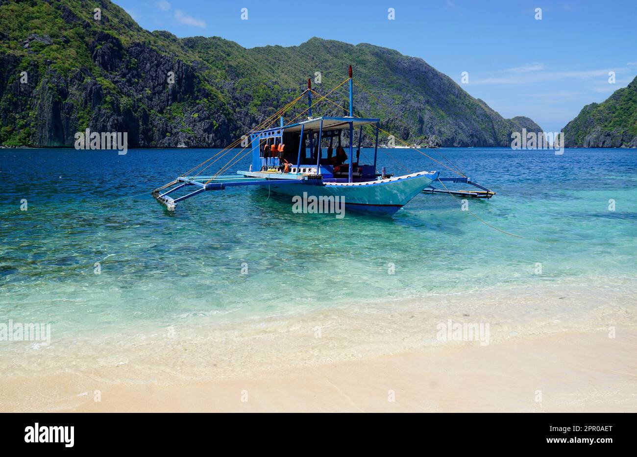 wooden traditional outrigger boats on palawan island at the philippines ...