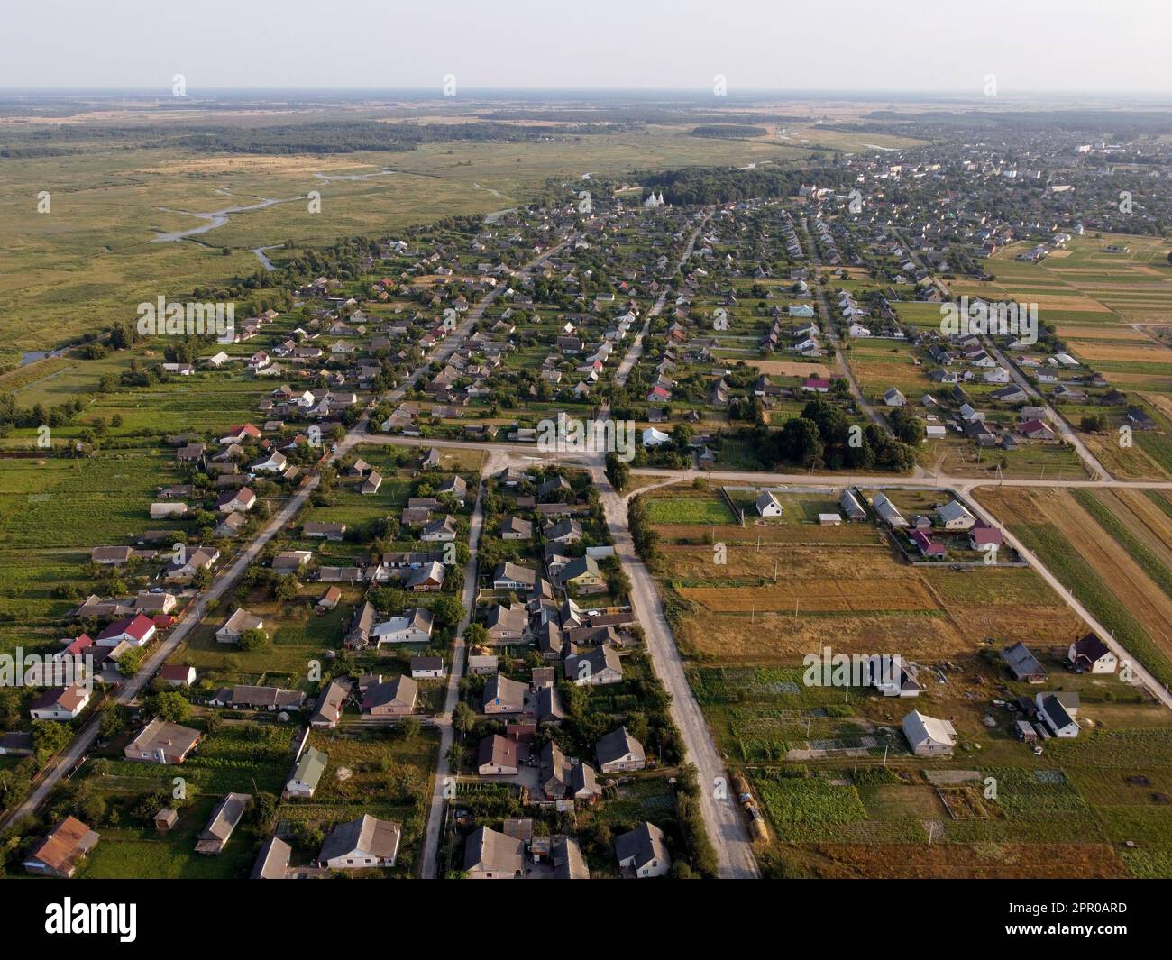 Aerial view of small village in Ukraine. Above view of rural area ...