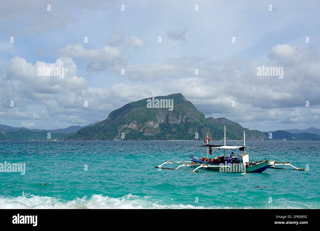 wooden traditional outrigger boats on palawan island at the philippines ...