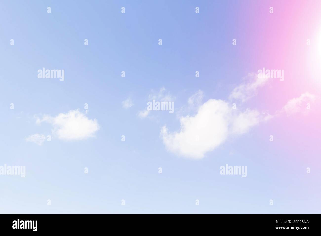 White airy beautiful clouds in a bright blue sky. Clear sunny weather ...