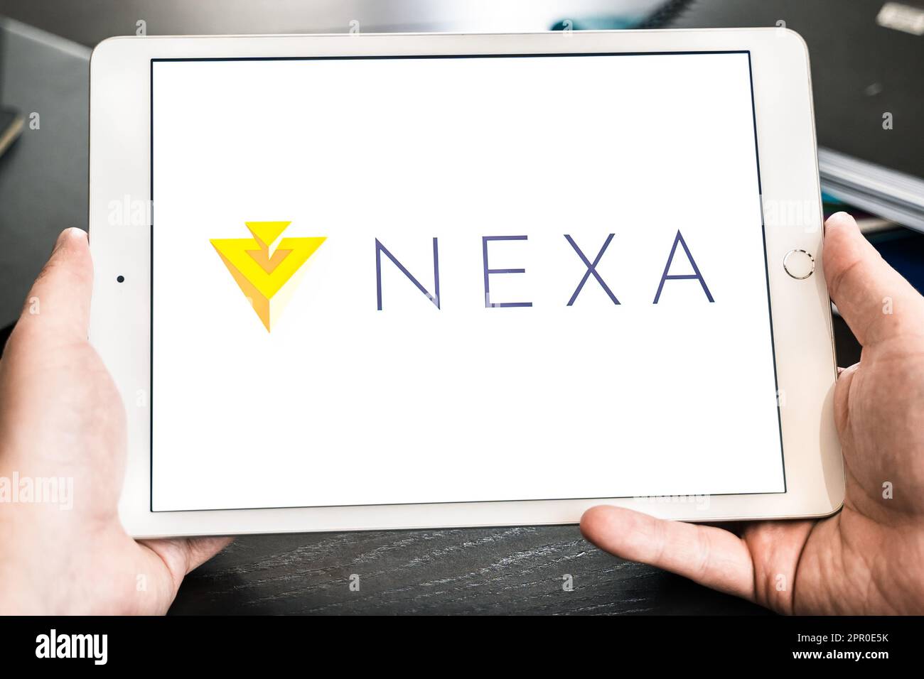 Russia Moscow 25.04.23 Logo of Nexa mining coin in tablen screen ...