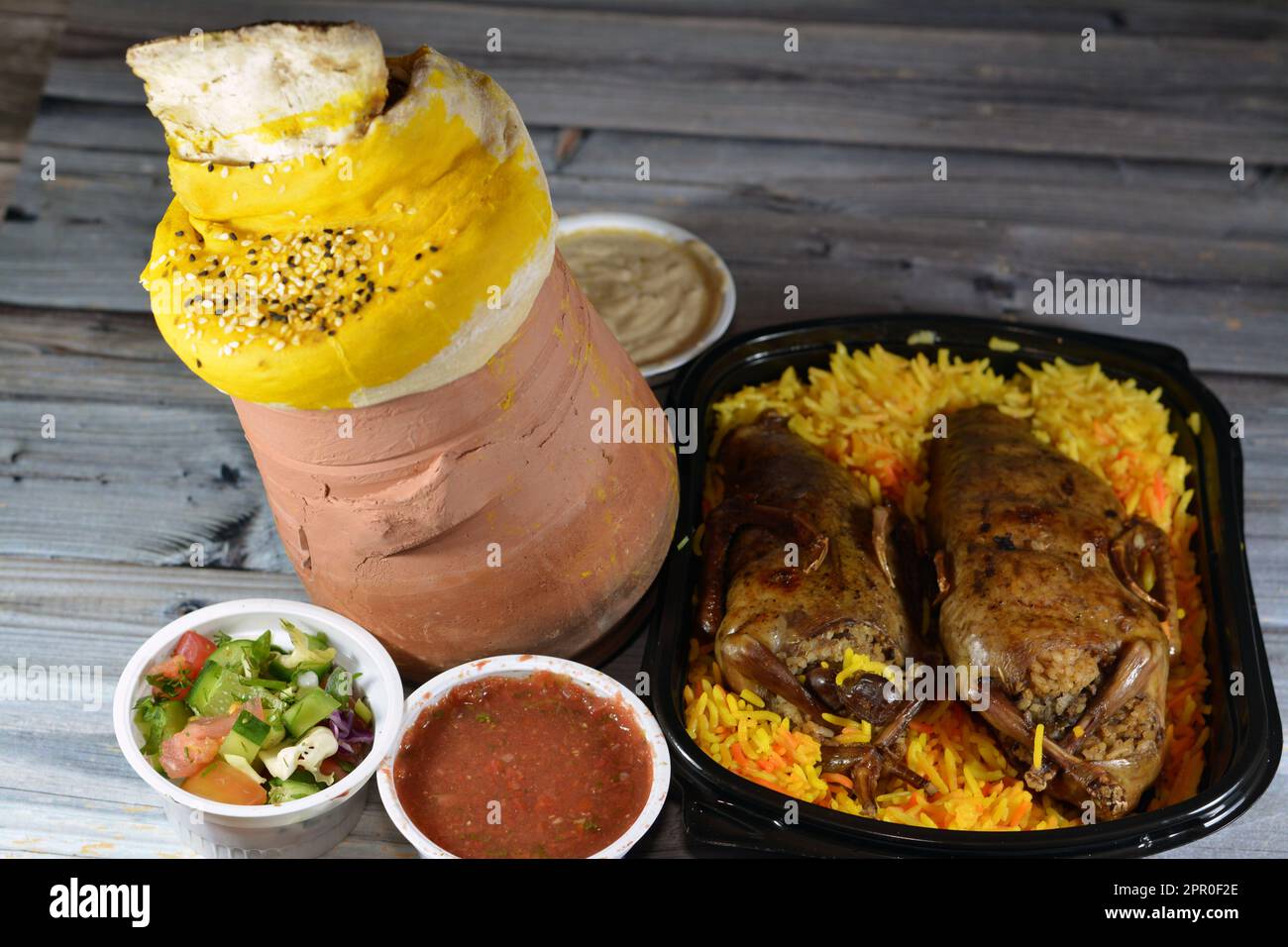 Background of Egyptian Hamam pigeons Mahshi stuffed squab with rice and ...