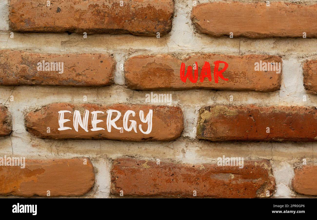 Energy war symbol. Concept words Energy war on beautiful red brown ...