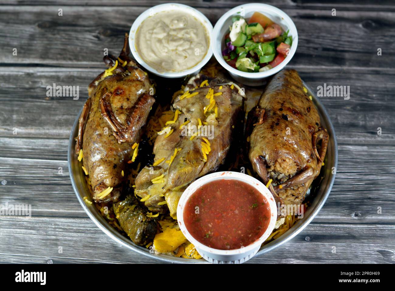 Egyptian Hamam pigeons Mahshi stuffed squab with rice and a lamb shank ...