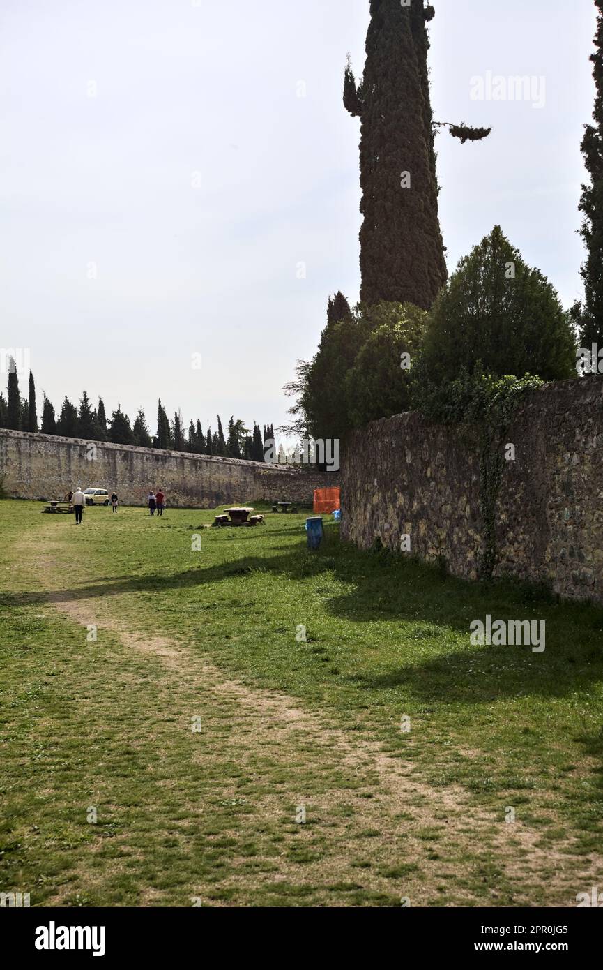 Large passage between boundary walls in a park by the hillside Stock ...