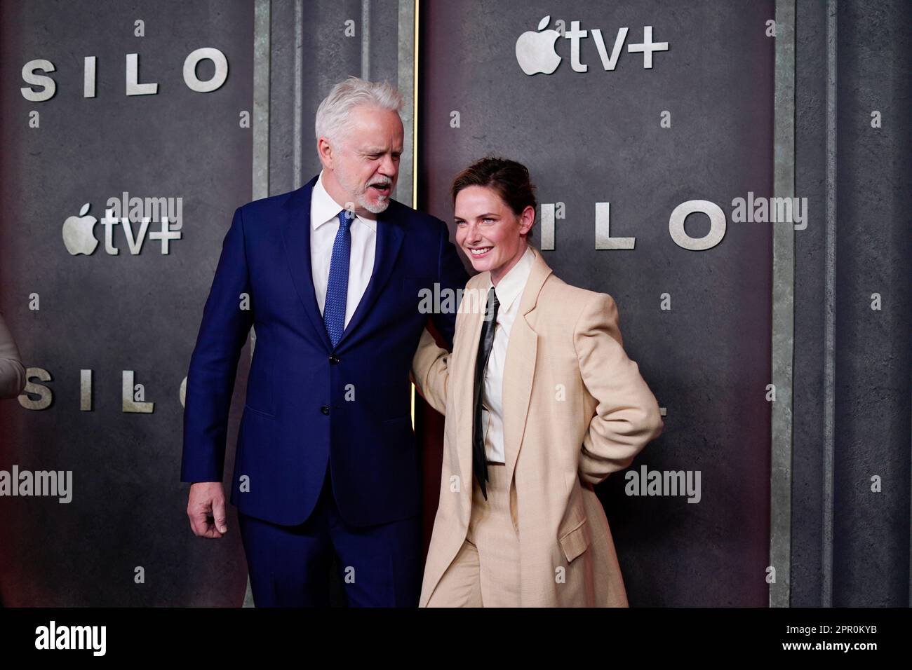 Actors Tim Robbins, left, and Rebecca Ferguson pose for photographers ...