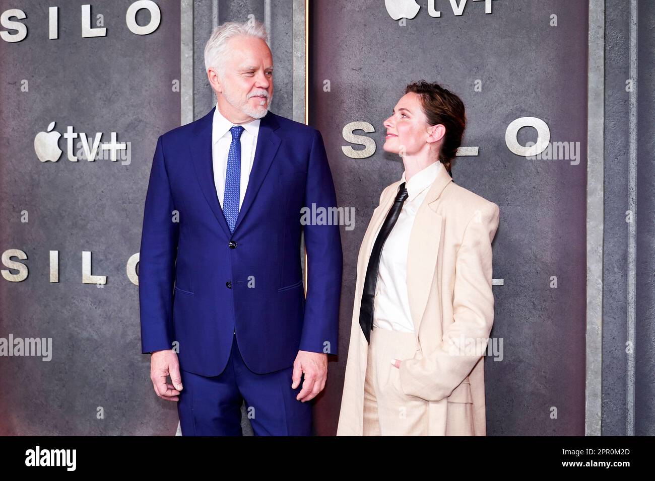 Actors Tim Robbins, left, and Rebecca Ferguson pose for photographers ...