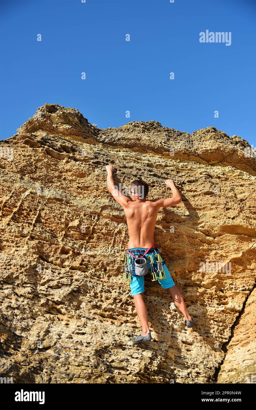 Man climbing up outdoor hi-res stock photography and images - Alamy