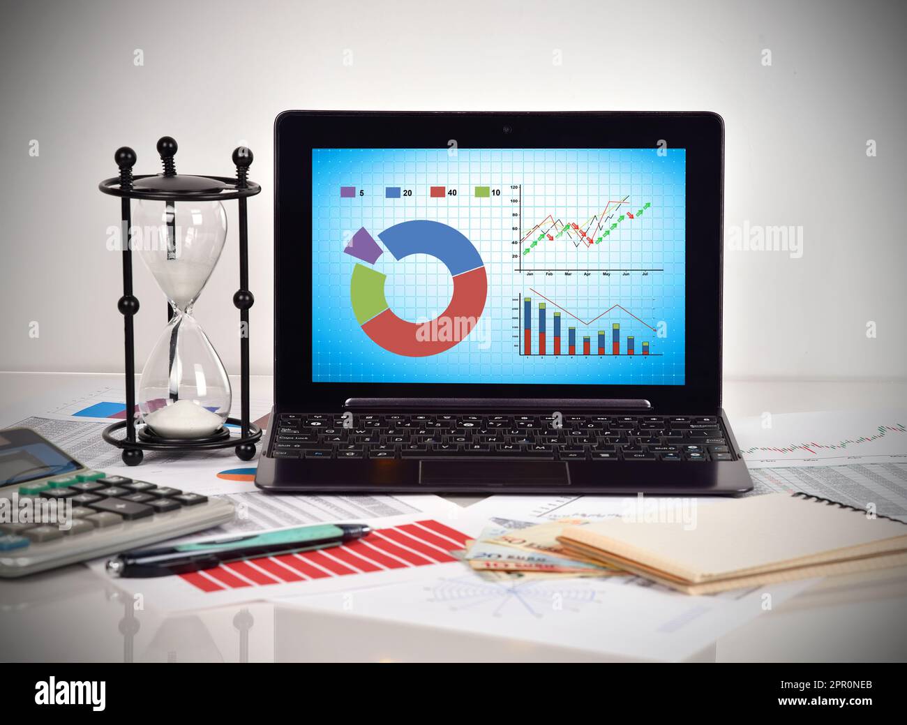 Stock chart on screen laptop. Financial and business charts and report ...