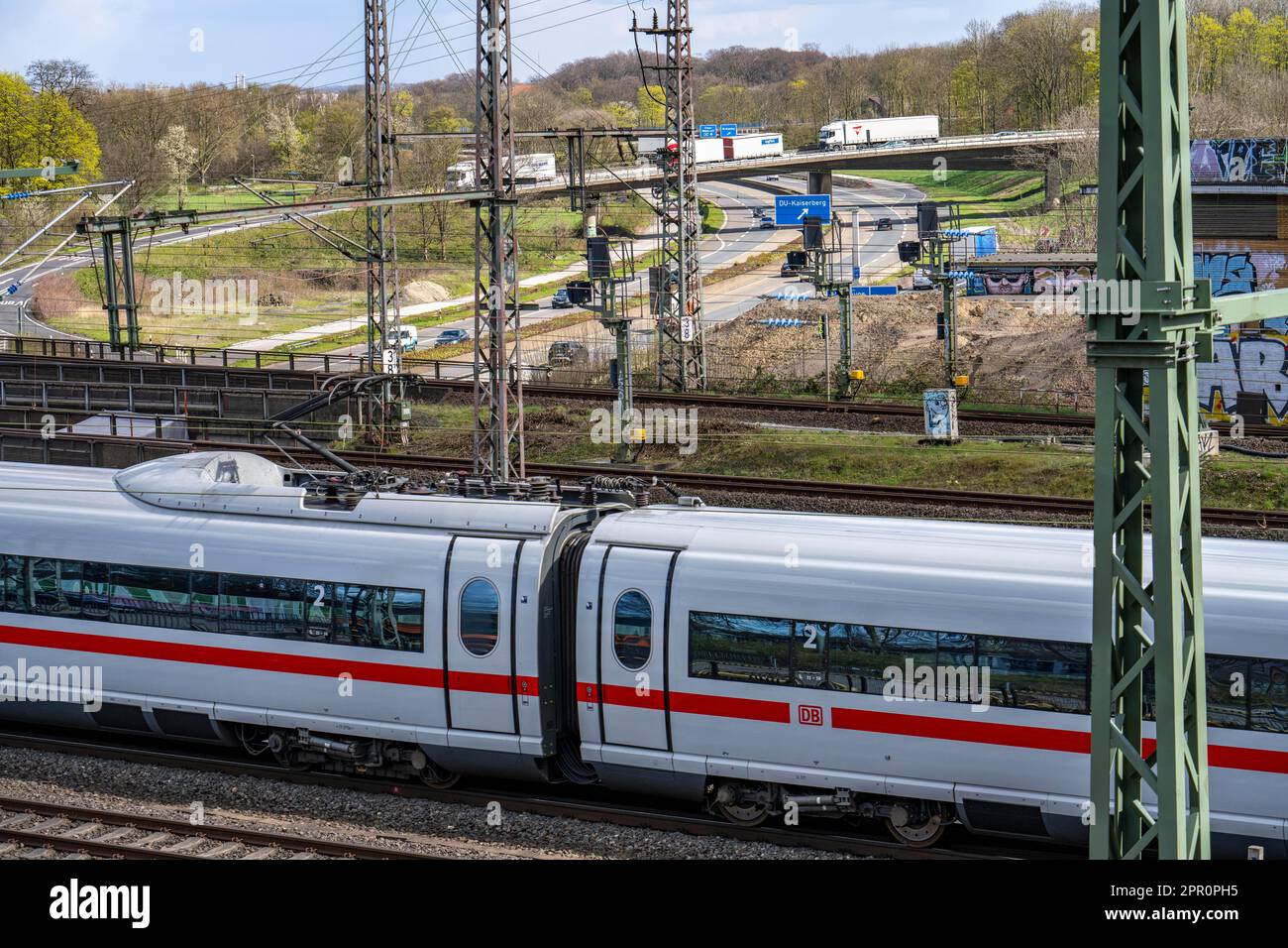 ICE train on the railway line at the Kaiserberg motorway junction, the ...