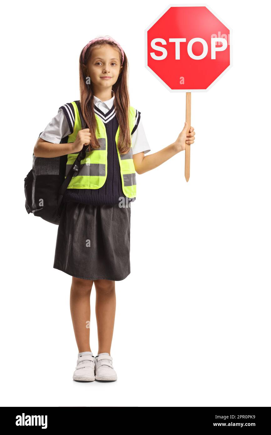 Full length portrait of a schoolgirl with a stop sign and safety vest ...