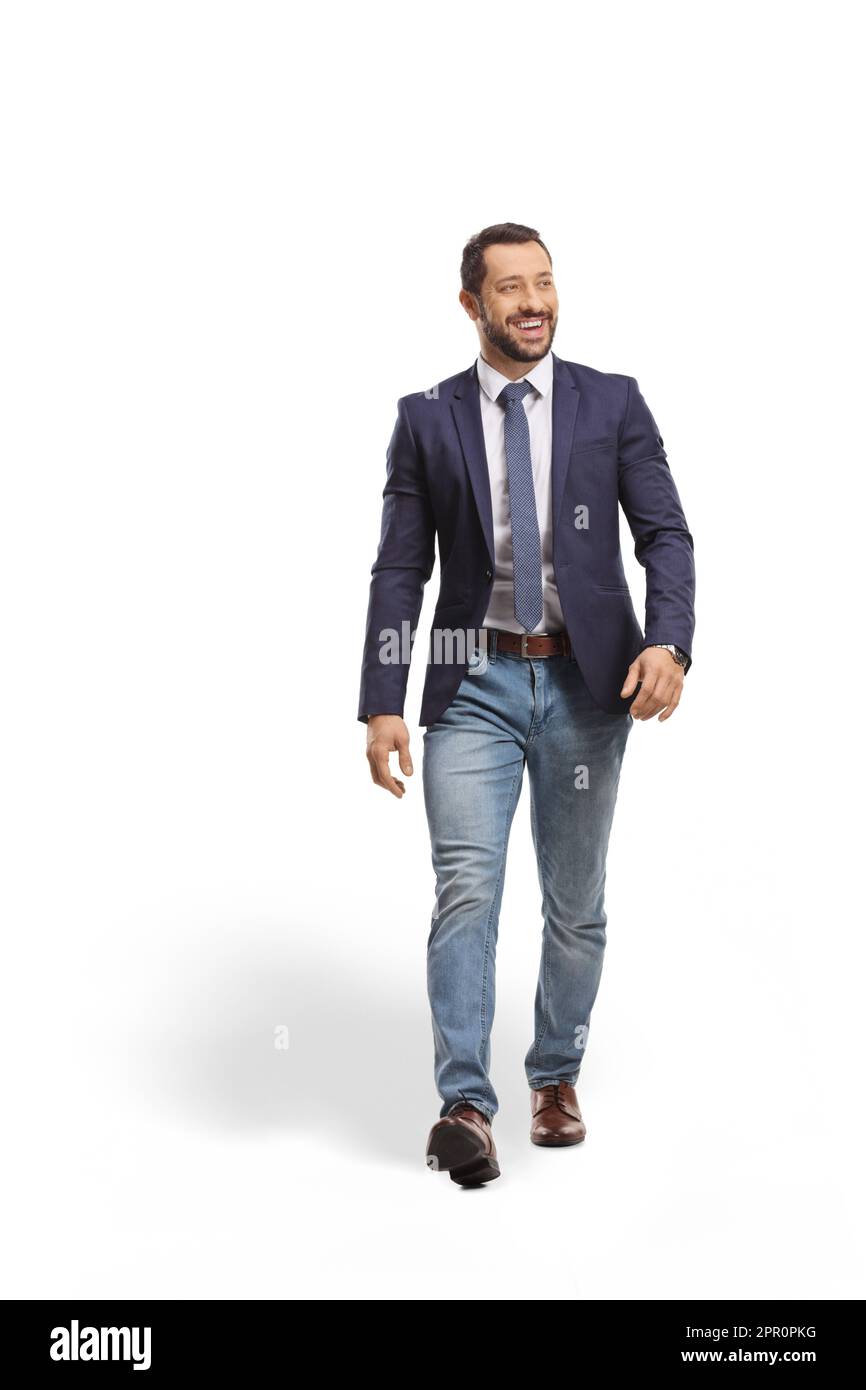 Happy professional man walking and smiling isolated on white background ...
