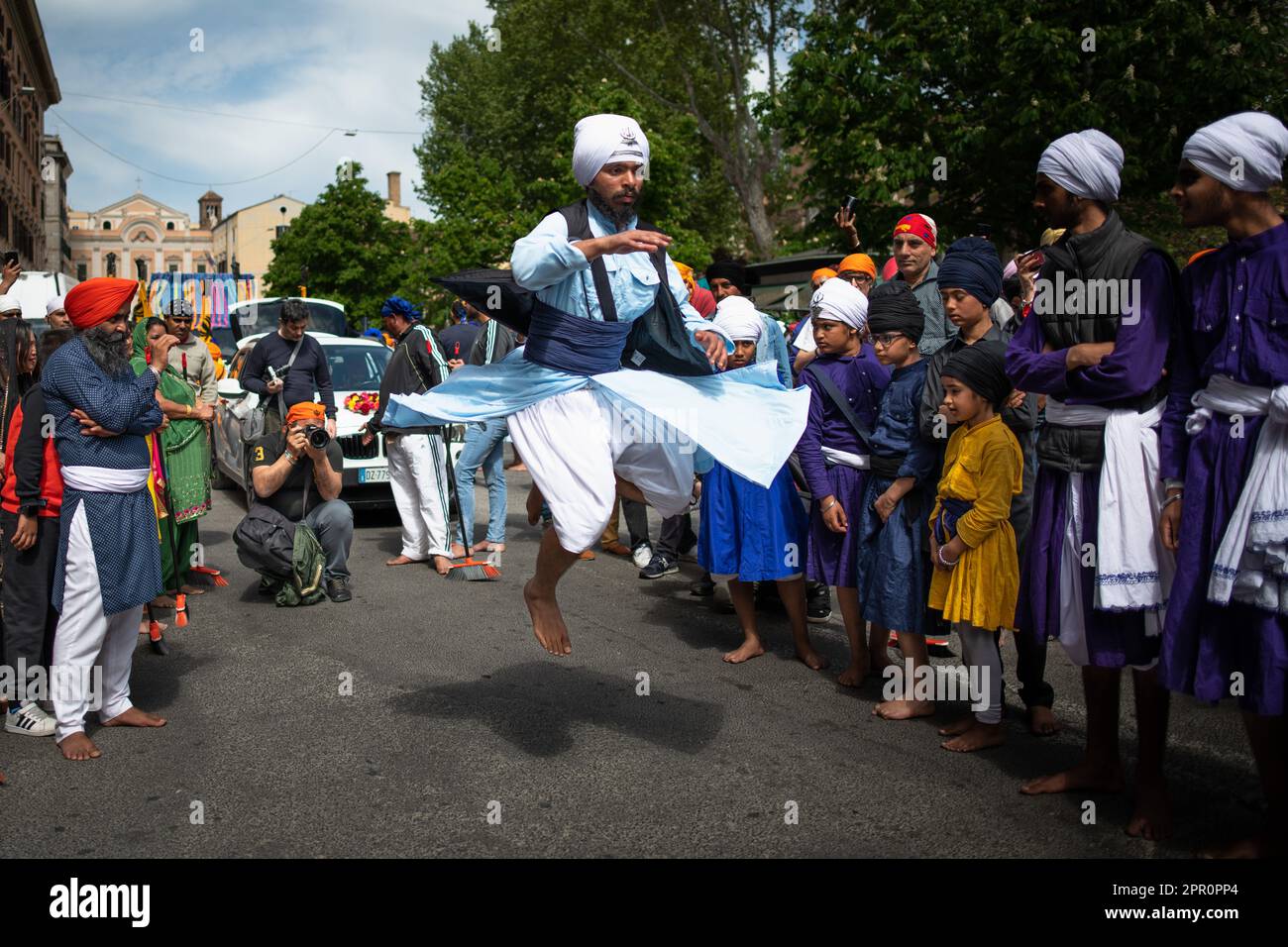 A Sikh performs during the procession for the Vaisakhi Nagar Kirtan in ...