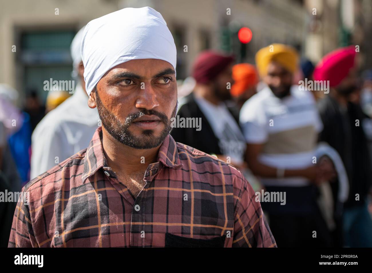 A Sikh man looks on during the procession for the Vaisakhi Nagar Kirtan ...