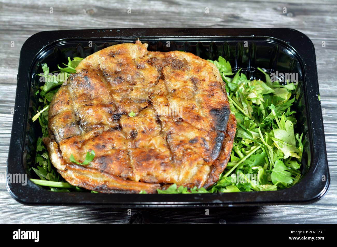 Traditional Egyptian dish Hawawshi, pita stuffed with minced meat and ...