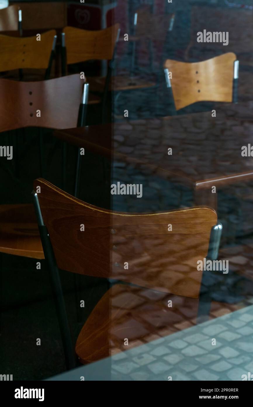 Cafe table chairs behind hi-res stock photography and images - Alamy