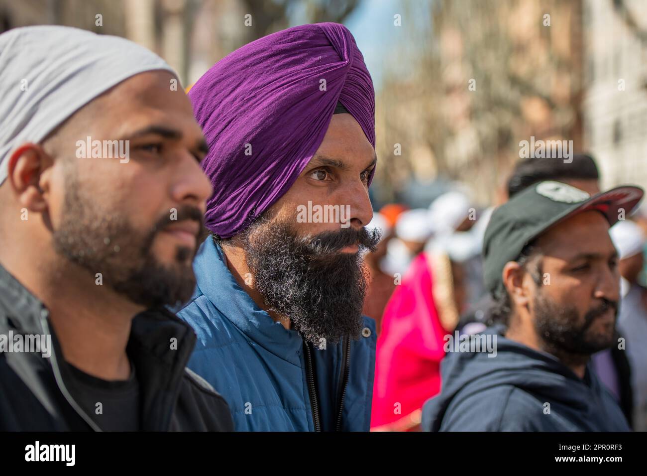 Sikh men look on during the procession for the Vaisakhi Nagar Kirtan in ...