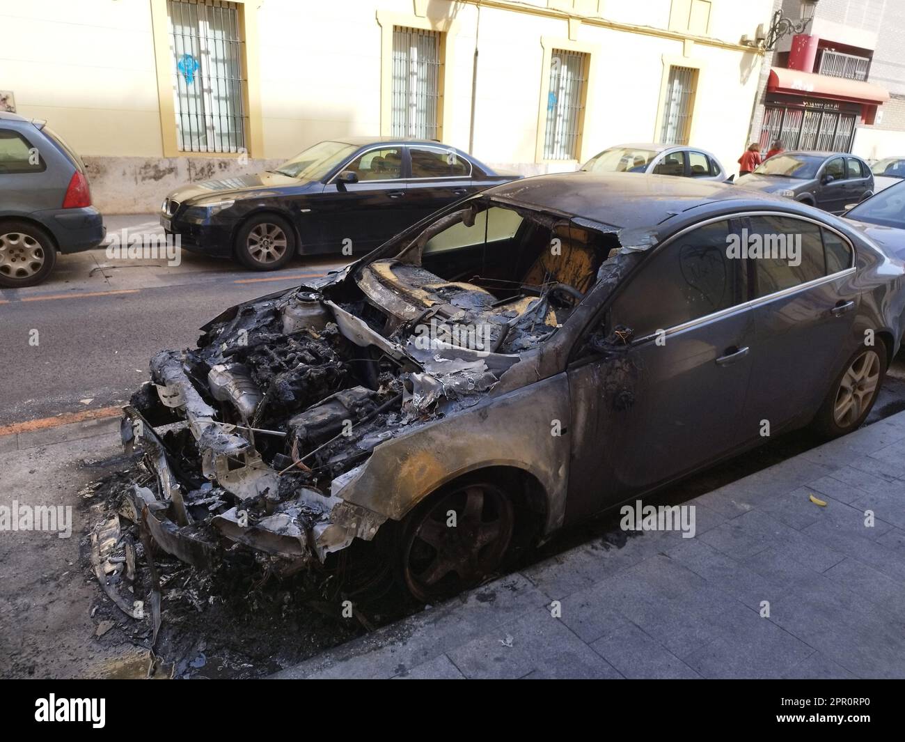 Burned Car on City Street Stock Photo - Alamy