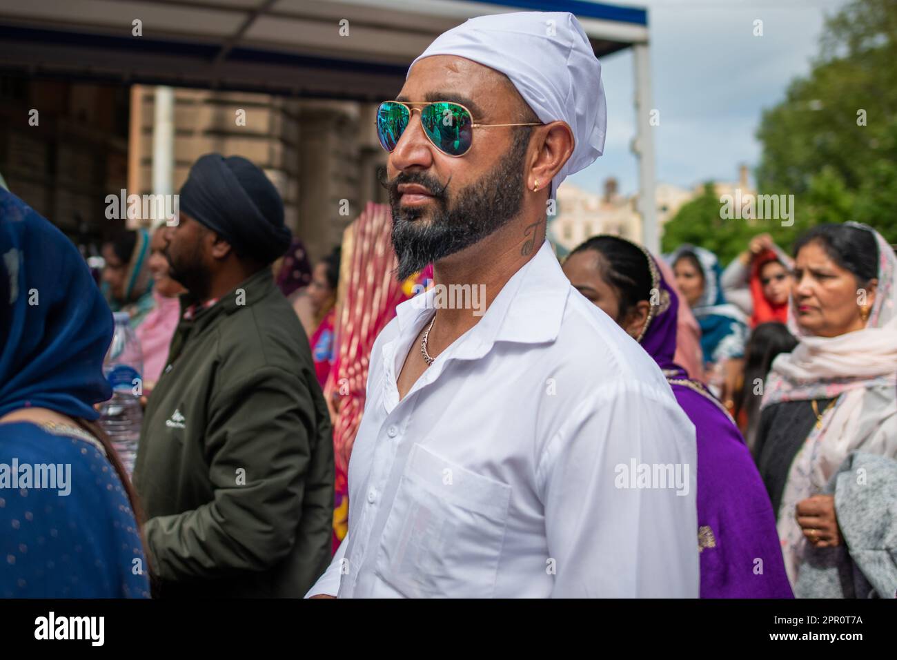 A Sikh man looks on during the procession for the Vaisakhi Nagar Kirtan ...