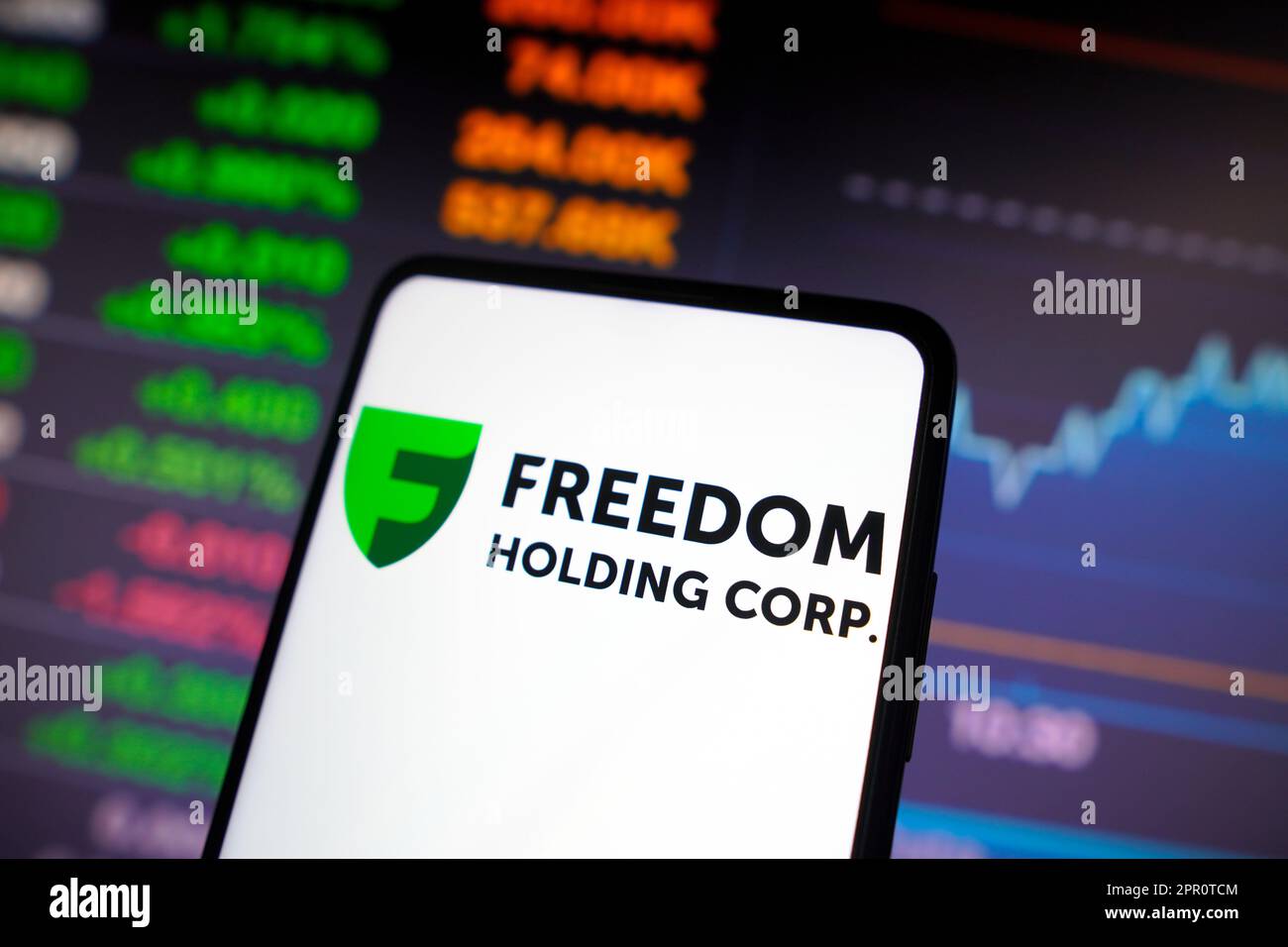 In this photo illustration, the Freedom Finance logo is displayed on a ...