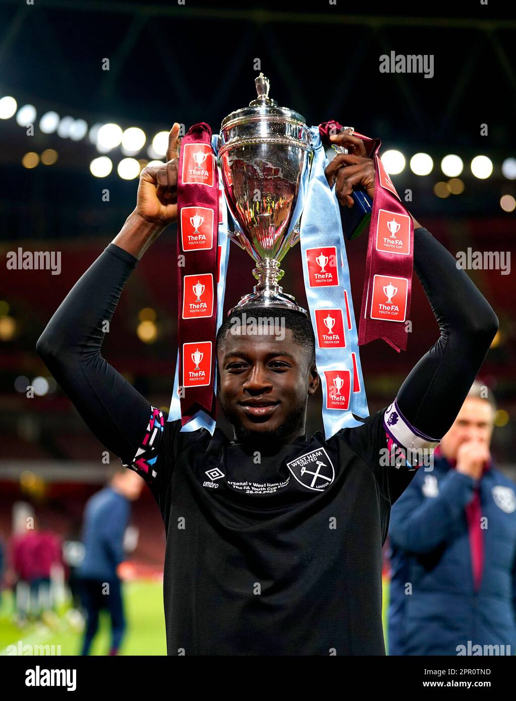 West Ham United's Gideon Kodua celebrates with the trophy after winning ...