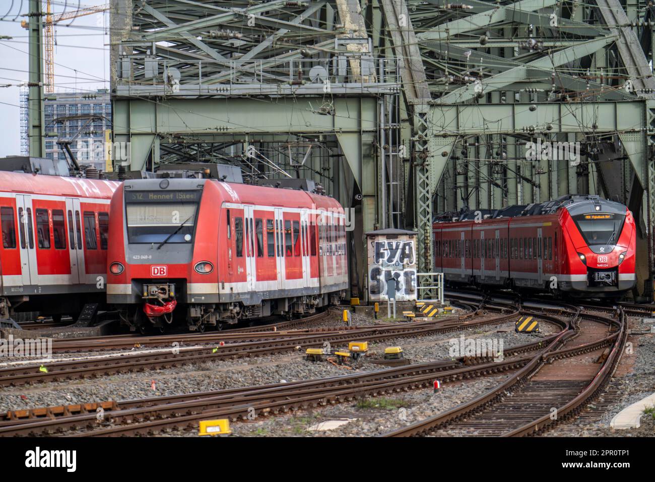 S-Bahn and regional trains in front of the main station of Cologne ...