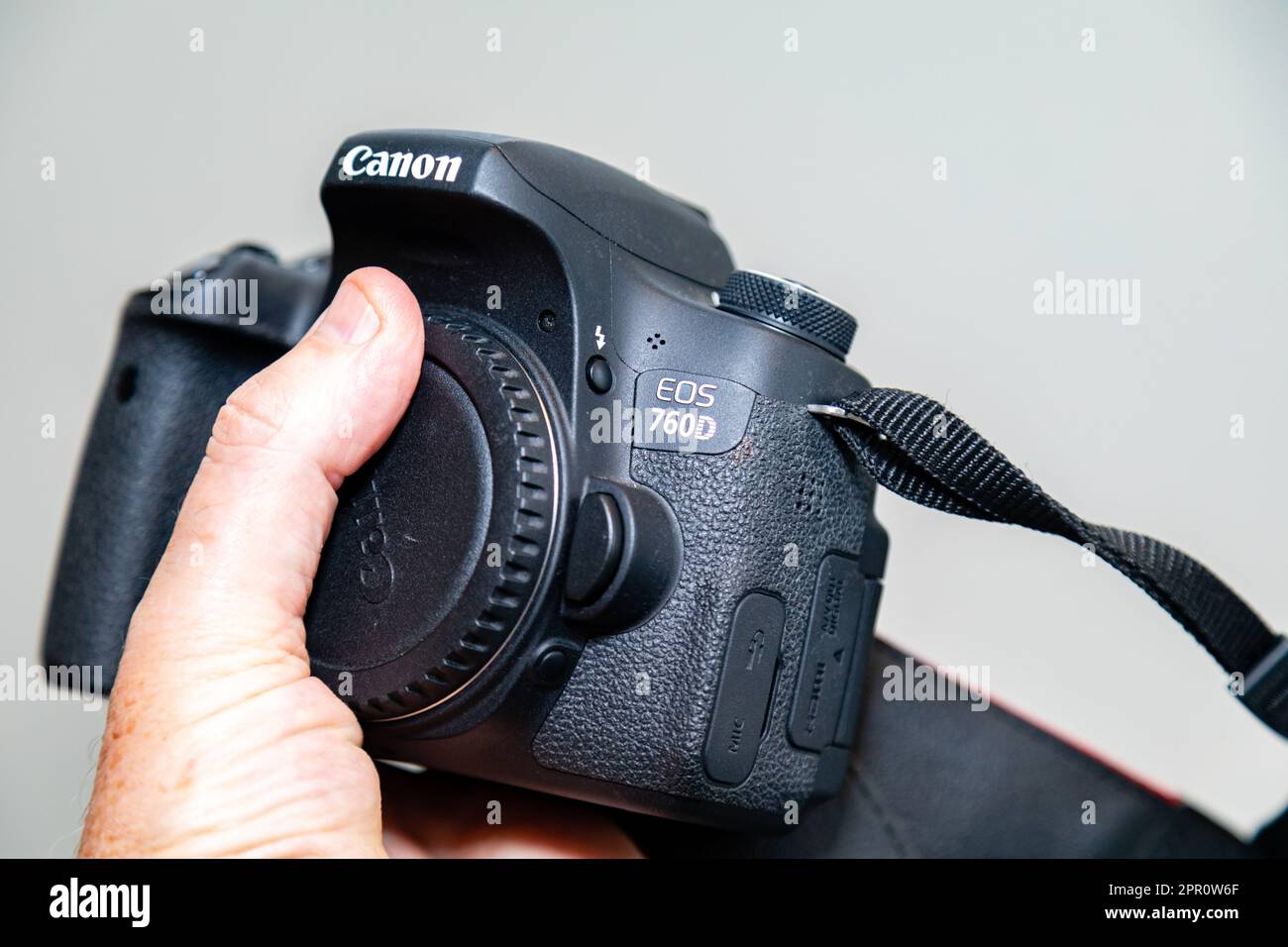 Canon 760D camera in hand Stock Photo - Alamy