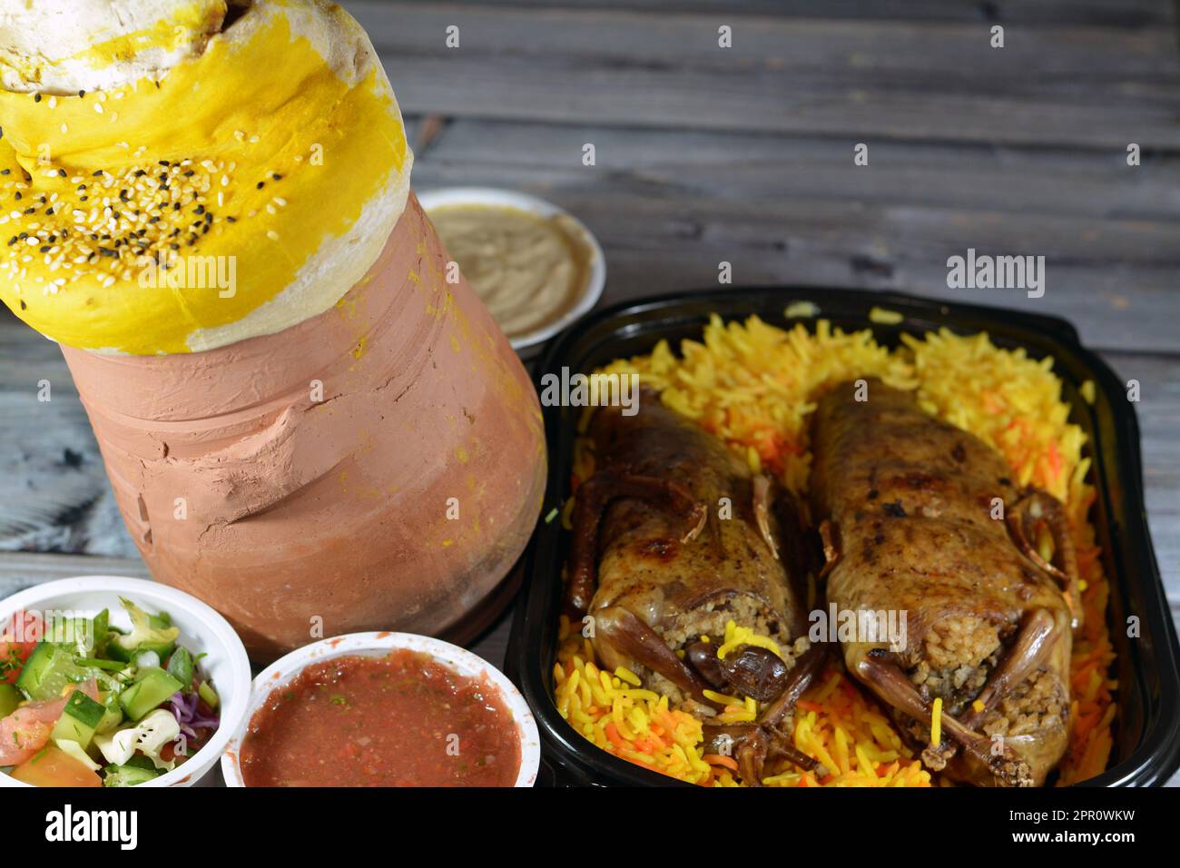 Background of Egyptian Hamam pigeons Mahshi stuffed squab with rice and ...