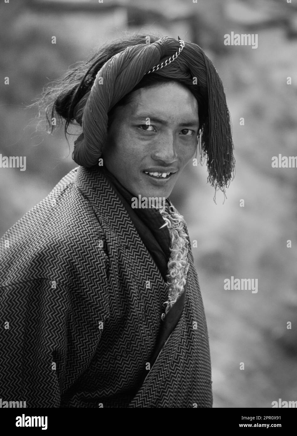 A PILGRIM from KHAM visits the DRIGUNG MONASTERY in CENTRAL TIBET Stock ...