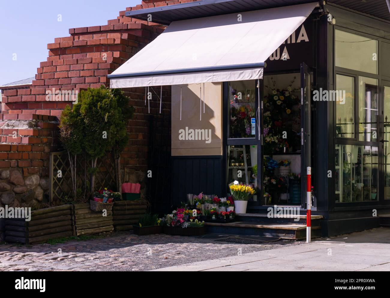 Tiny flower shop in the historic center of the Warshaw city, Poland ...