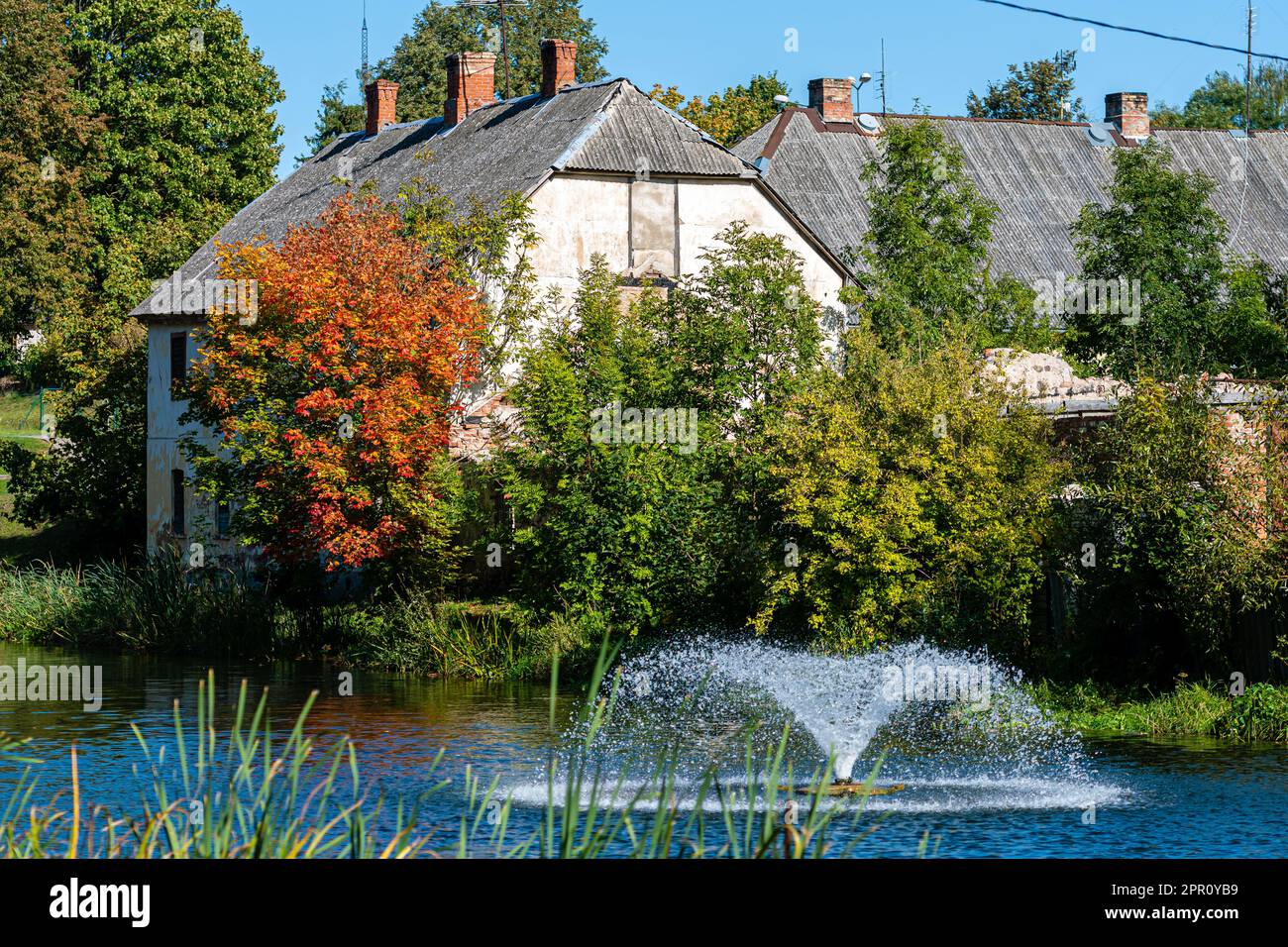 Dobele. Latvia. Autumn landscape with an old mill building by the river ...