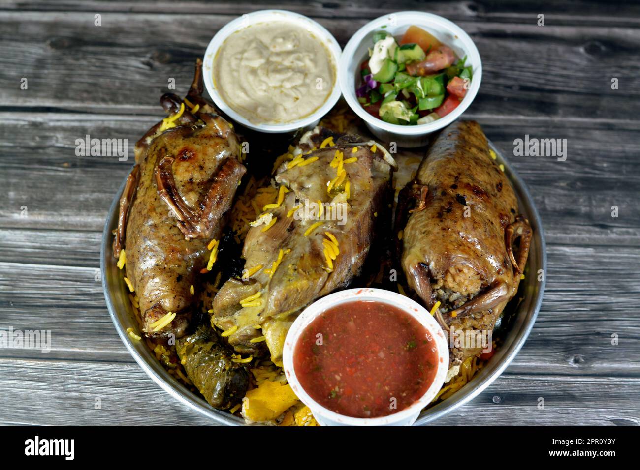 Egyptian Hamam pigeons Mahshi stuffed squab with rice and a lamb shank ...