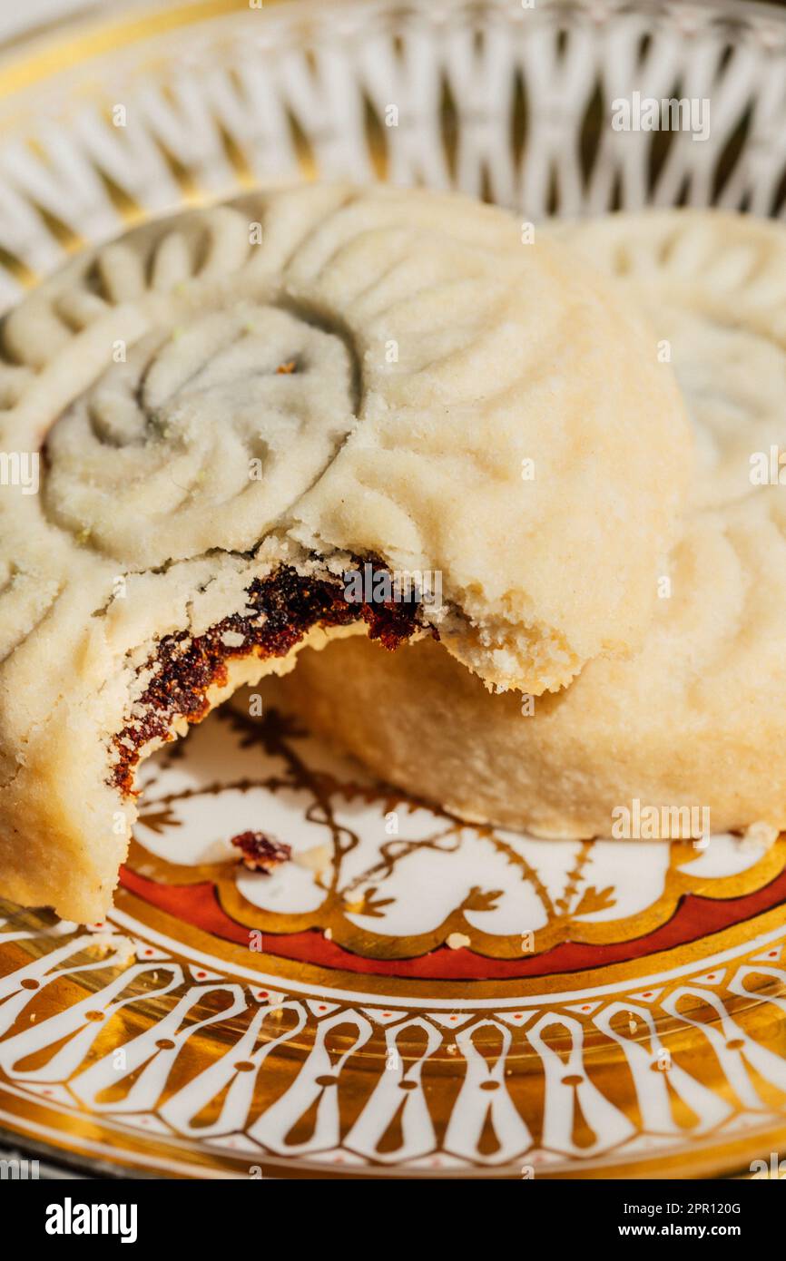 bite taken out of date-filled ma'amoul cookie Stock Photo - Alamy