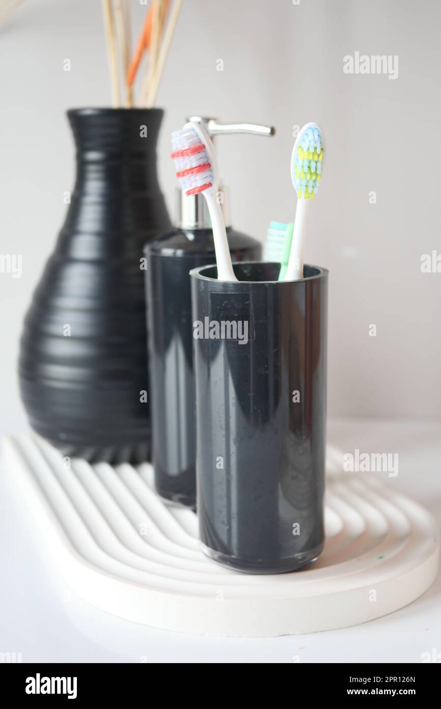 Tooth brushes paste powder hi-res stock photography and images - Alamy