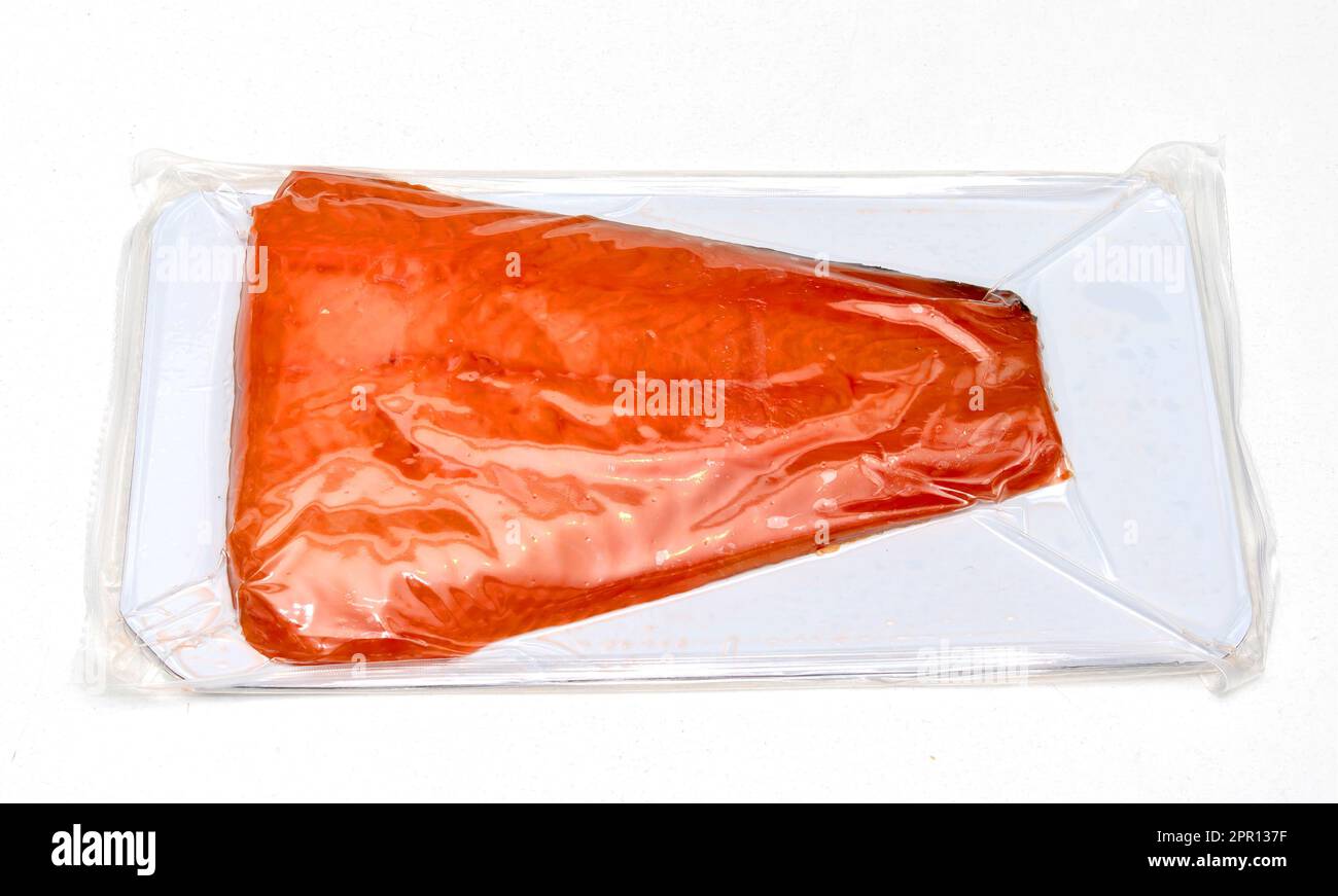 Raw cold smoked salmon packed in plastic bag sold in supermarket Stock ...