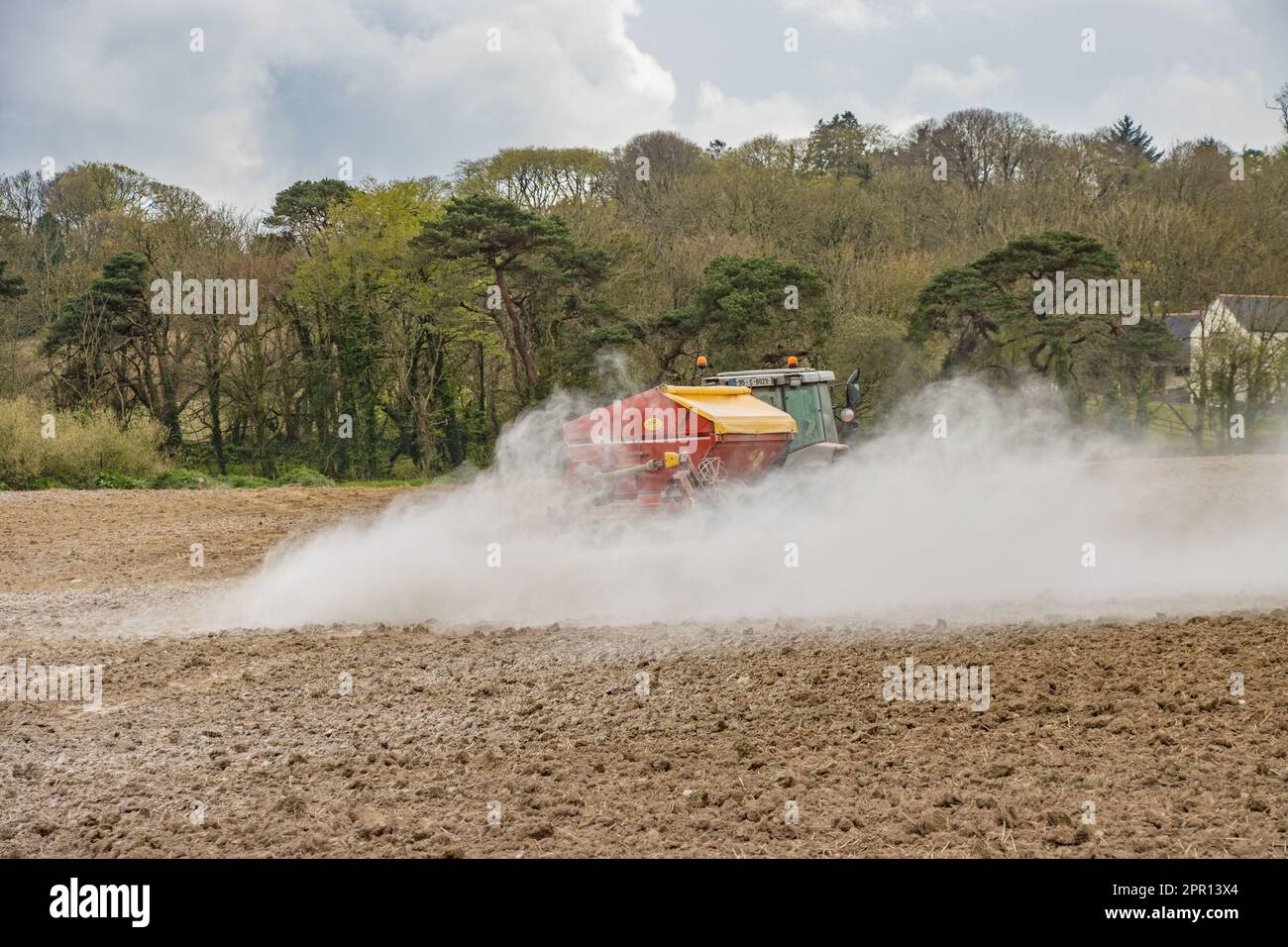 Spreading ground limestone ahead of planting barley, near Timoleague ...