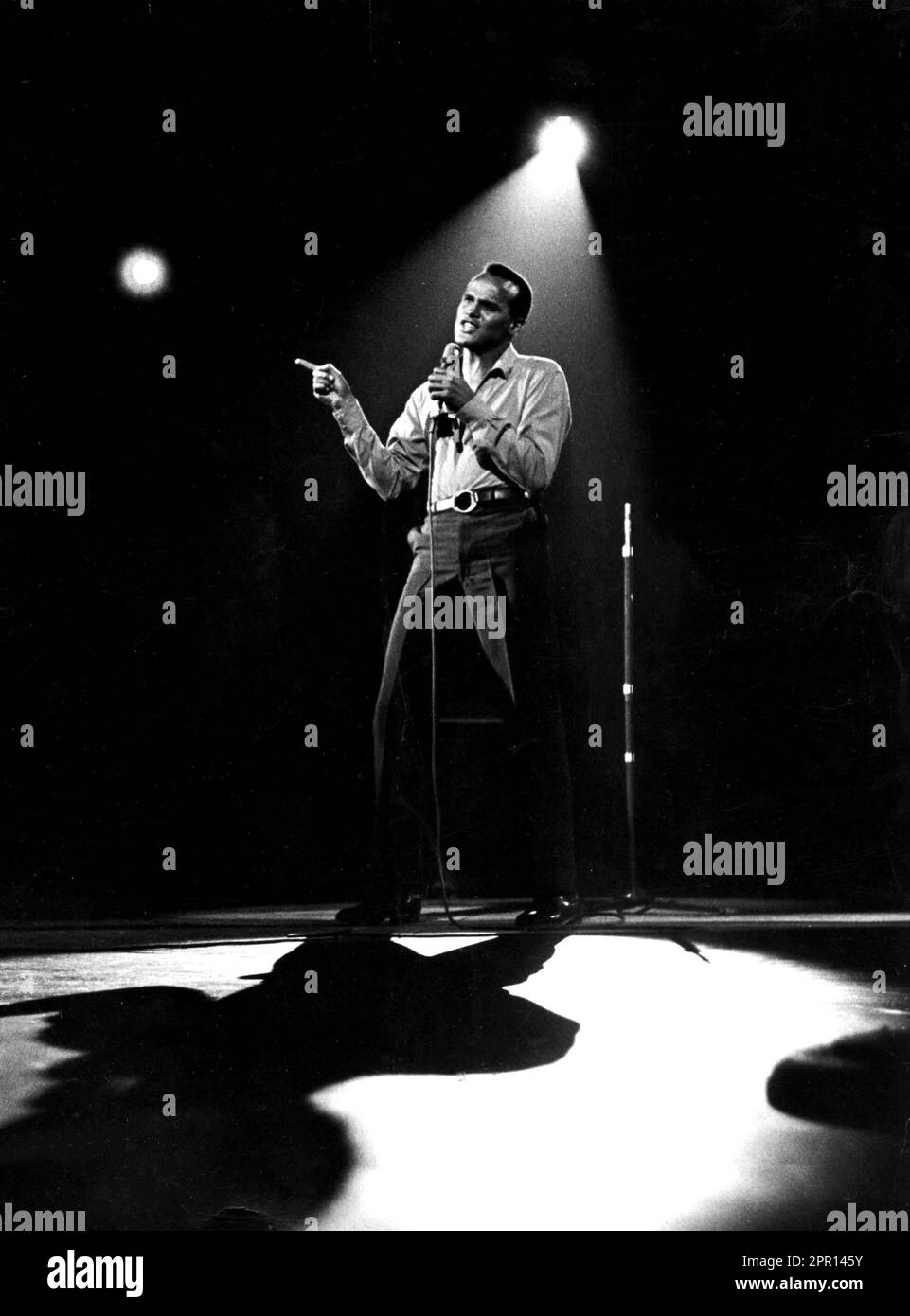 Circa 1960, Hollywood, California, USA: Actor HARRY BELAFONTE sings on ...