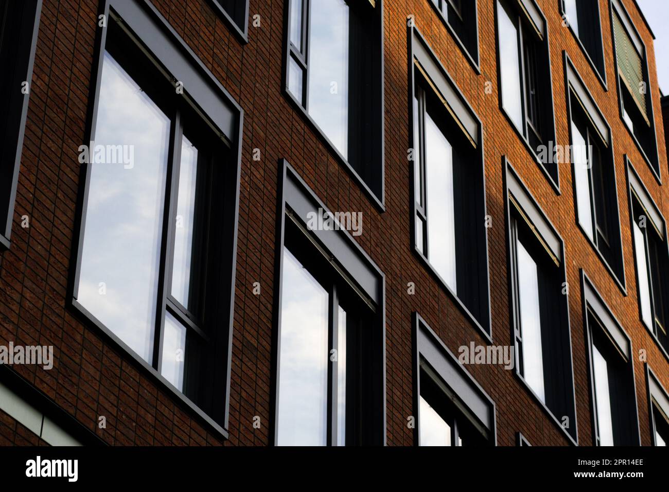 brown buiding and window reflection Stock Photo - Alamy