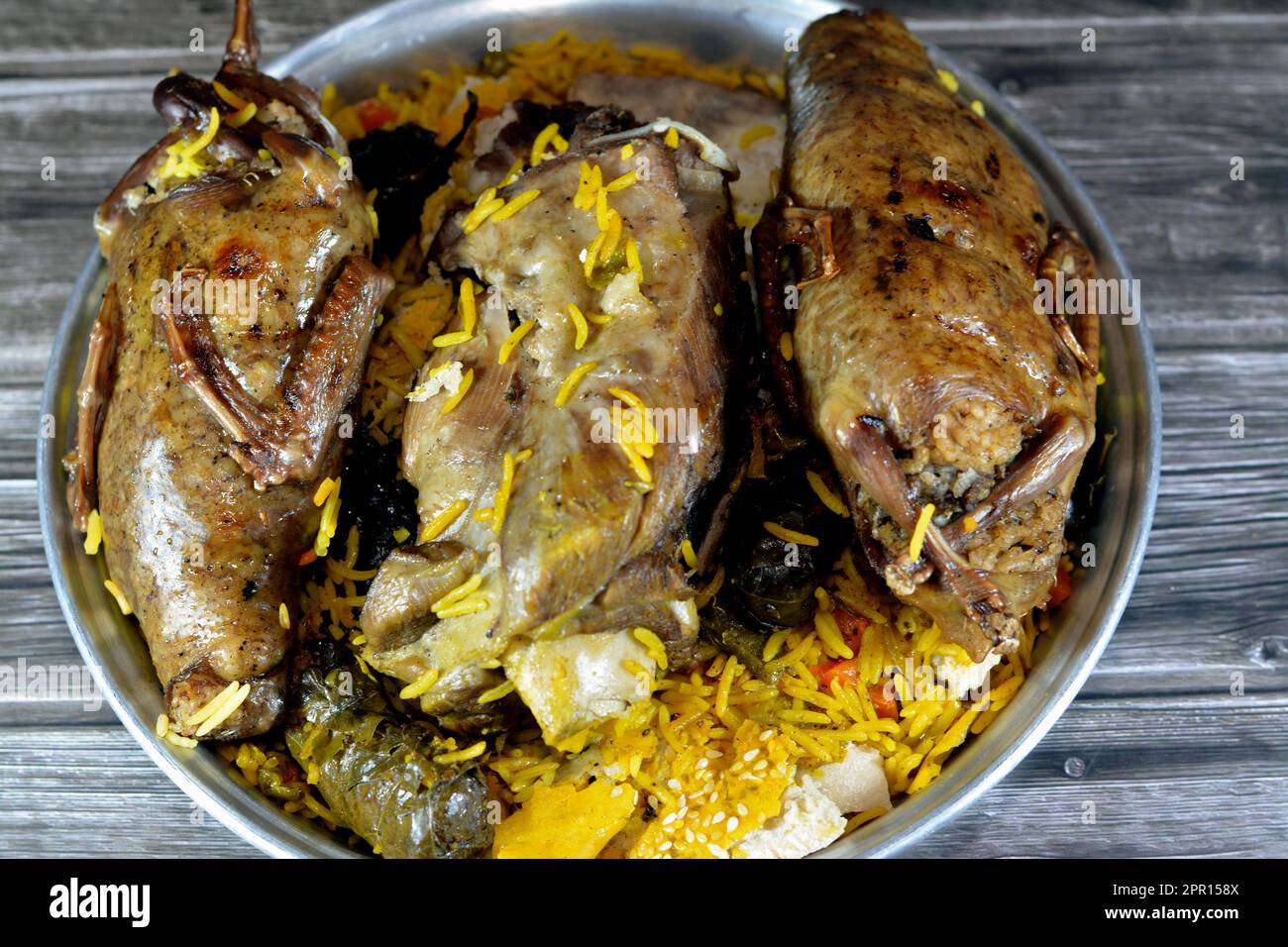 Egyptian Hamam pigeons Mahshi stuffed squab with rice and a lamb shank ...