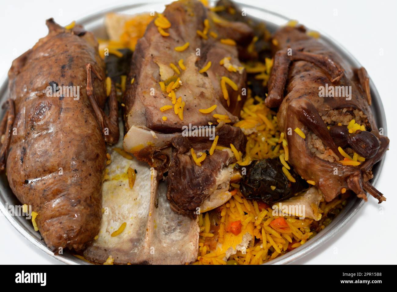 Egyptian Hamam pigeons Mahshi stuffed squab with rice and a lamb shank ...