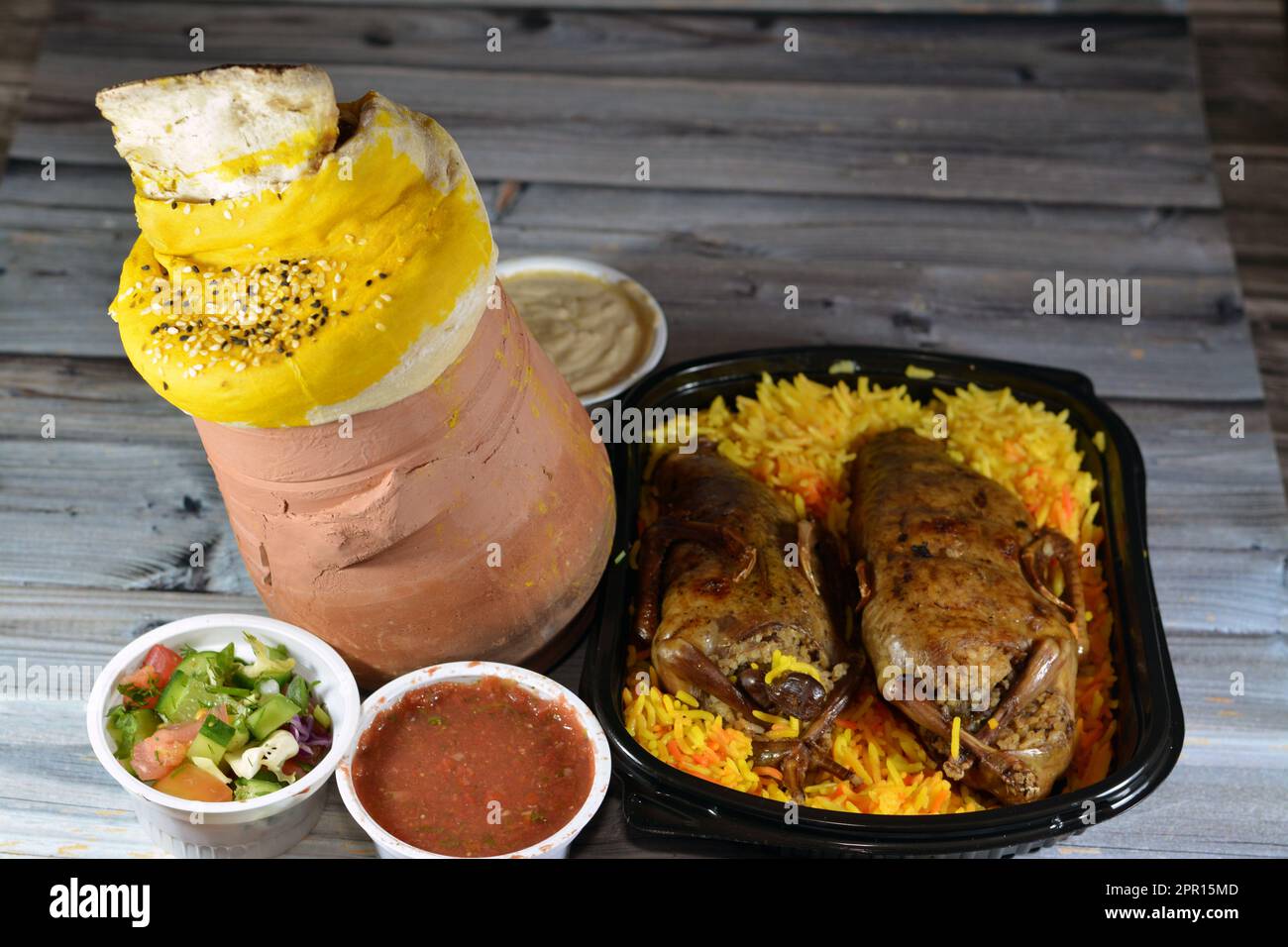 Background of Egyptian Hamam pigeons Mahshi stuffed squab with rice and ...