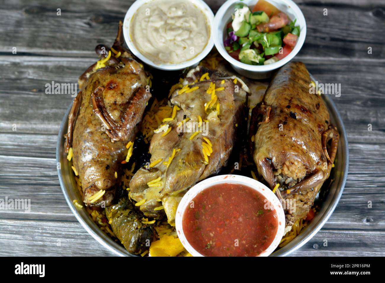 Egyptian Hamam pigeons Mahshi stuffed squab with rice and a lamb shank ...