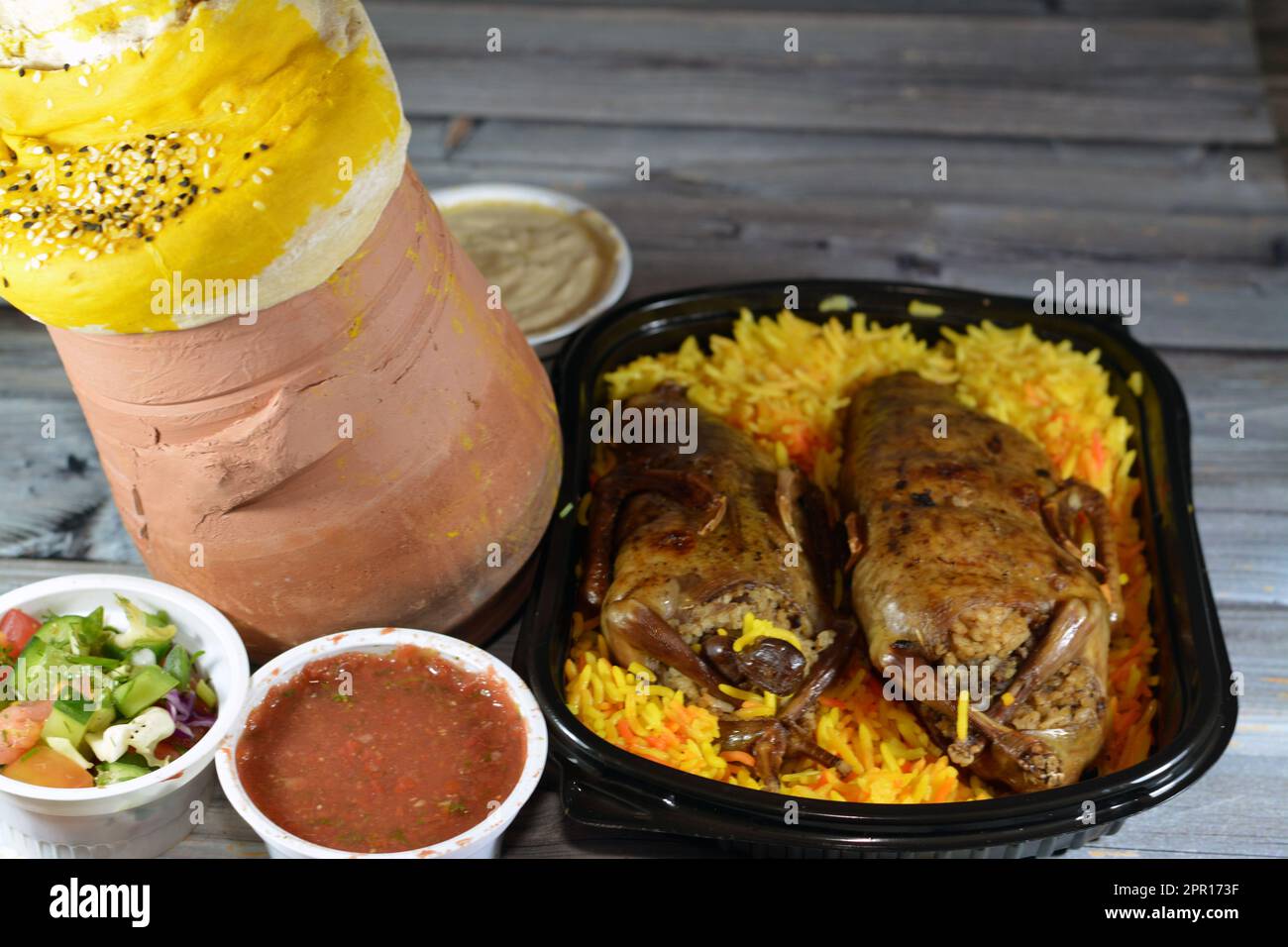 Background of Egyptian Hamam pigeons Mahshi stuffed squab with rice and ...