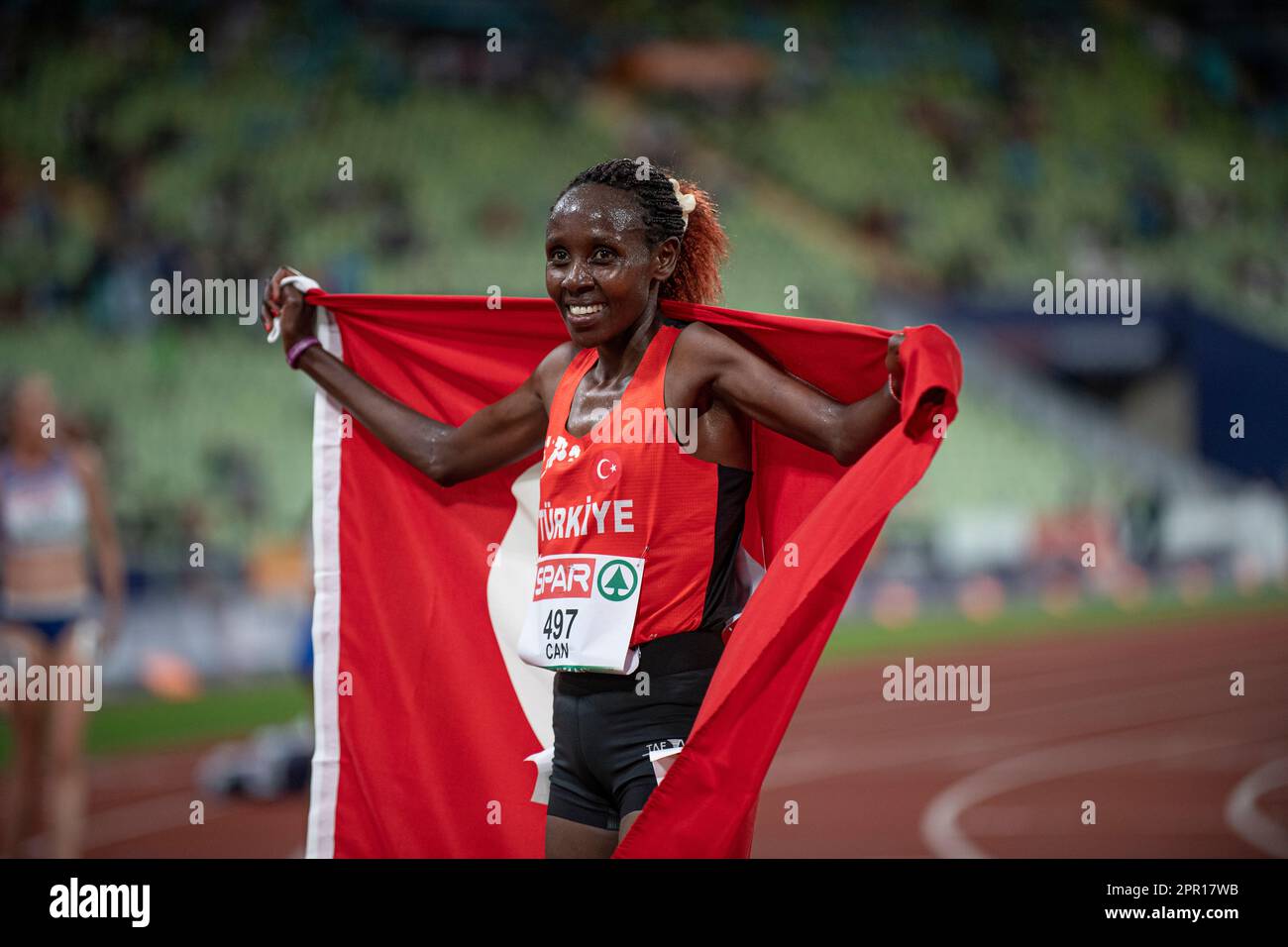 Yasemin Can with his country's flag, celebrating his medal in the ...