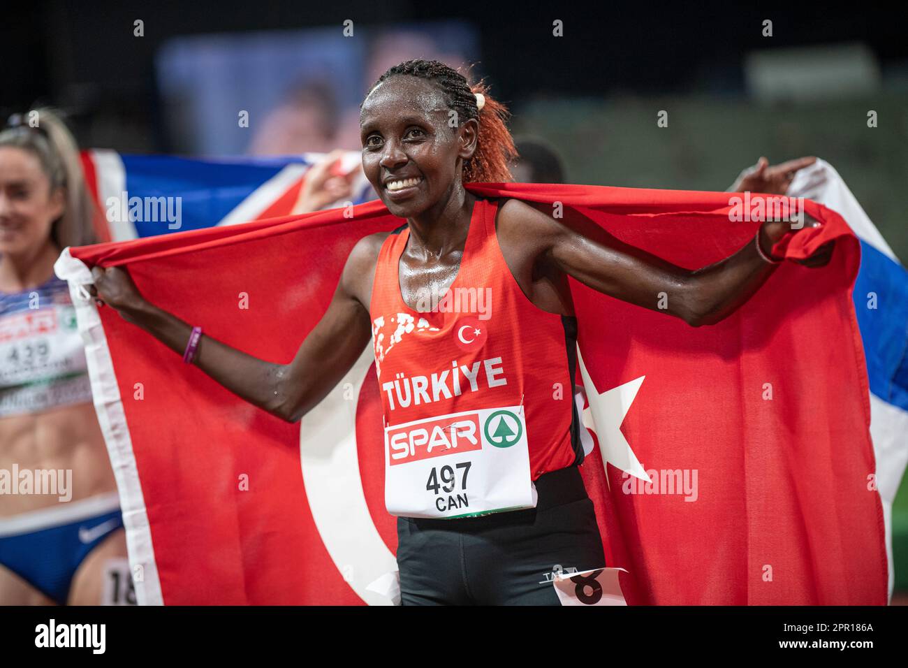 Yasemin Can with his country's flag, celebrating his medal in the ...