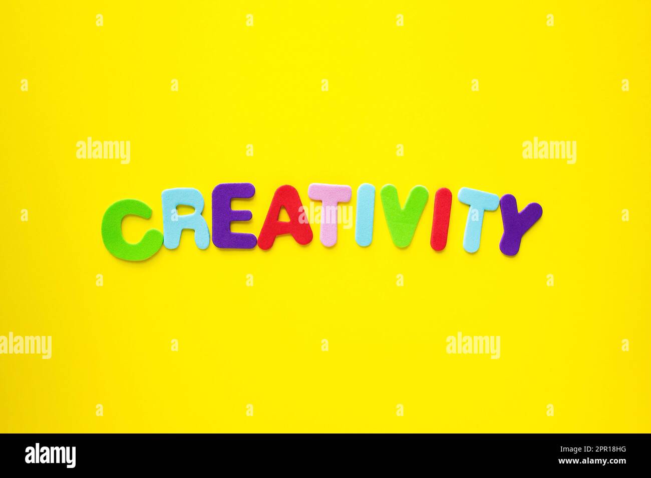 Creativity word by colored alphabet letters isolated on yellow ...