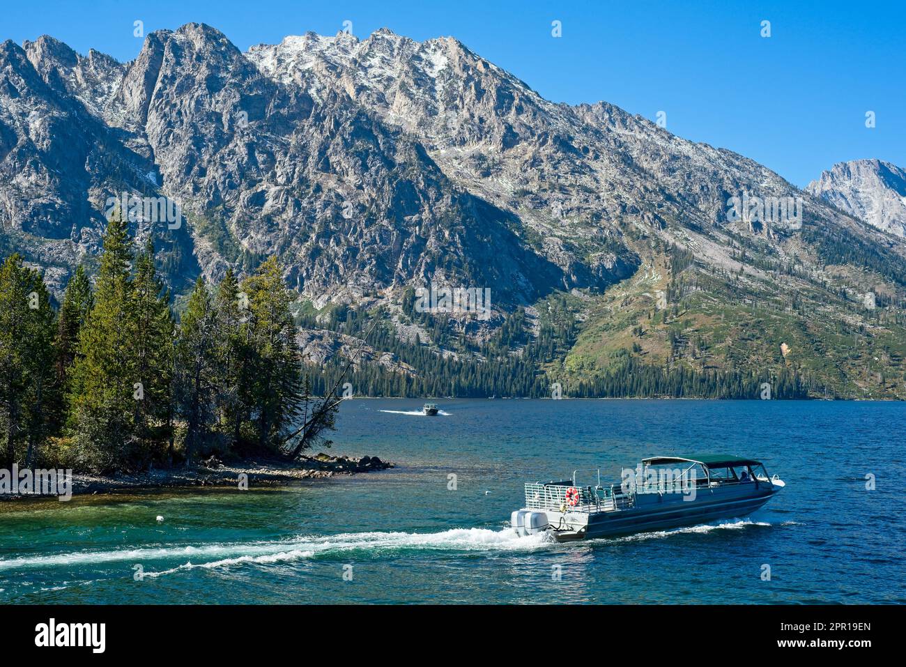 Shuttle boats on Jenny Lake in Grand Teton National Park ferry ...