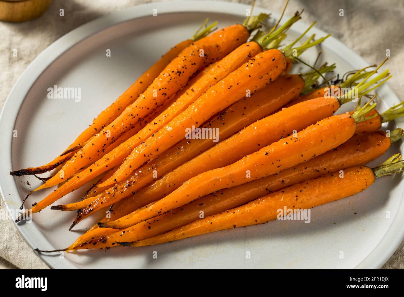 Raw Orange Organic Whole Roasted Carrots with Salt and Pepper Stock ...