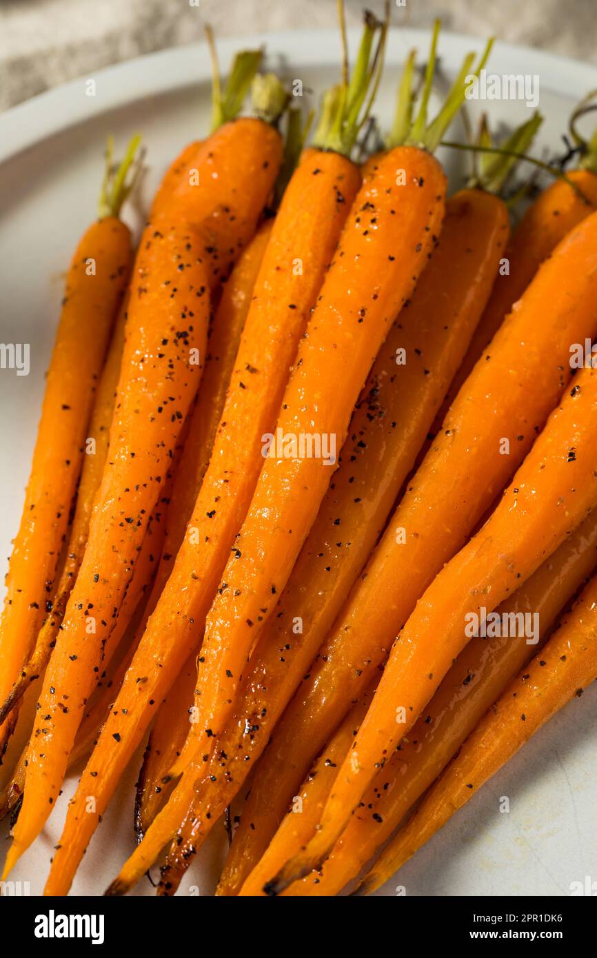 Raw Orange Organic Whole Roasted Carrots with Salt and Pepper Stock ...