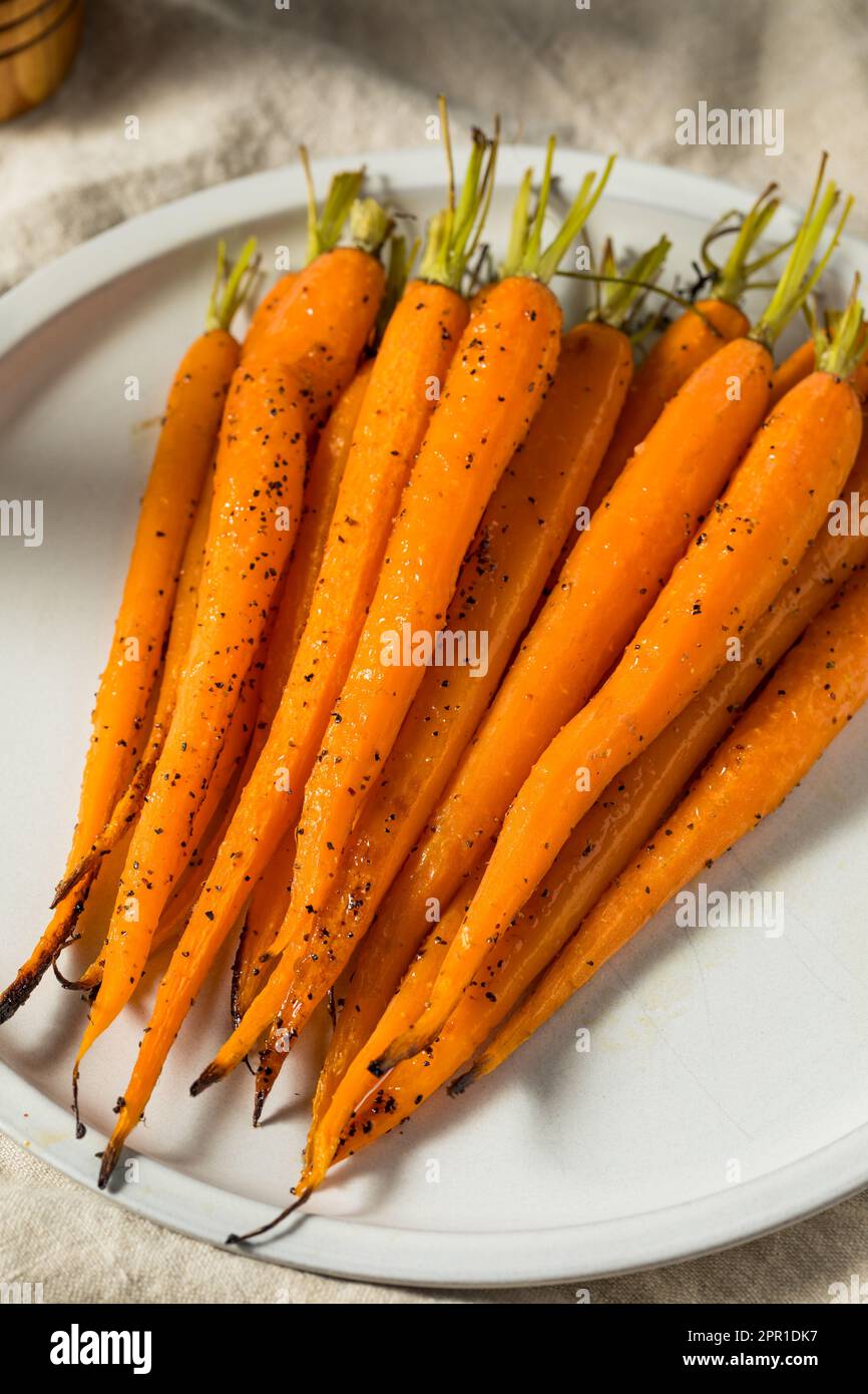 Raw Orange Organic Whole Roasted Carrots with Salt and Pepper Stock ...